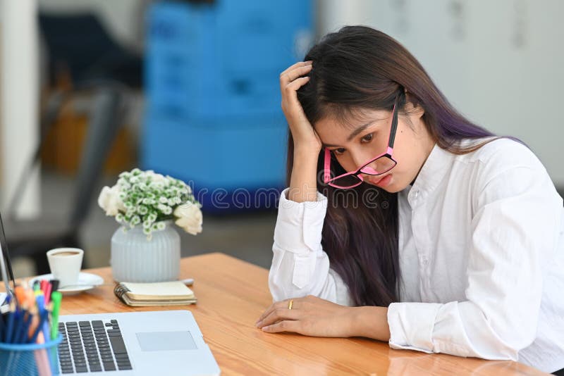 Bored Female Sitting at Her Workplace in the Office. Stock Image ...