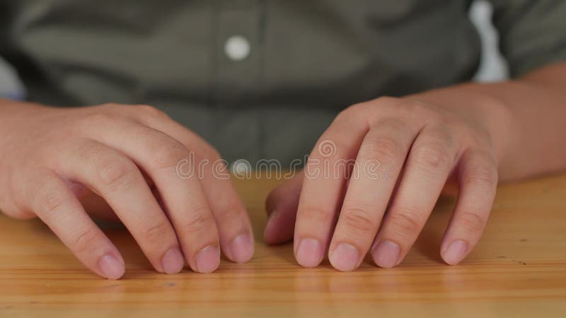 A Bored Man Tapping His Fingers on the Table. Hand of a Man Knocking on ...