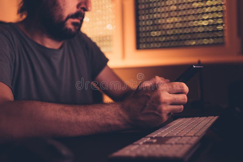 Bored Man Wasting Time Using Mobile Phone Stock Image - Image of gadget ...