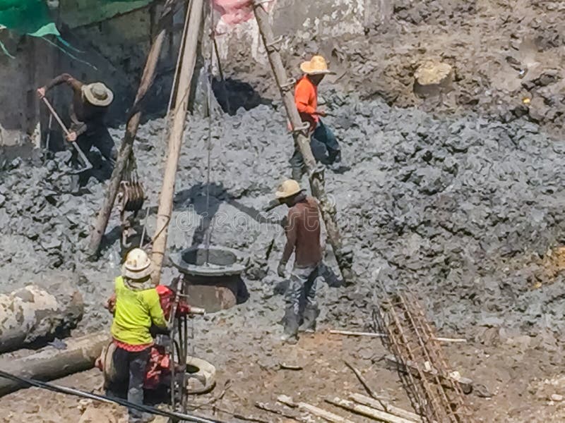 Bored Piling Workers are Drilling Mud Hole with Tripod Rig and S Stock ...