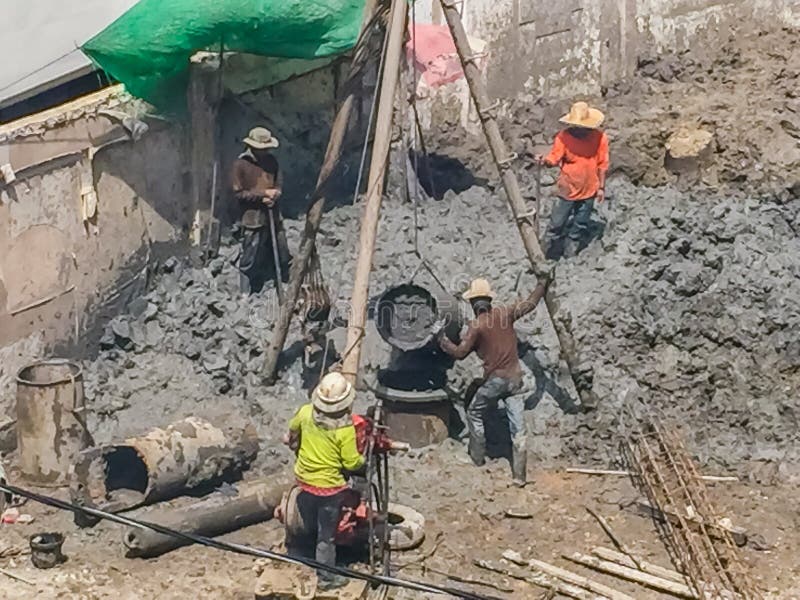 Bored Piling Workers are Drilling Mud Hole with Tripod Rig and S Stock ...
