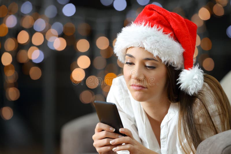 Bored or Sad Woman Checking Phone in Christmas Stock Image - Image of ... Bored or Sad Woman Checking Phone in Christmas Stock Image - Image of ...