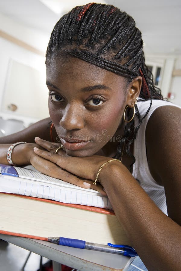 Bored Female Student in Classroom Stock Photo - Image of student, chin ...