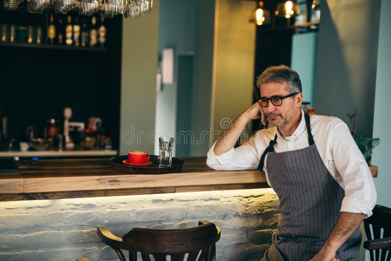 Bored Waiter Sitting in Cafe Bar Stock Image - Image of caucasian ...