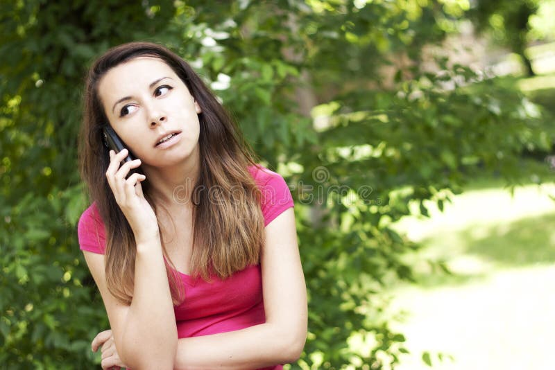 Bored woman on the phone stock photo. Image of beautiful - 25505288
