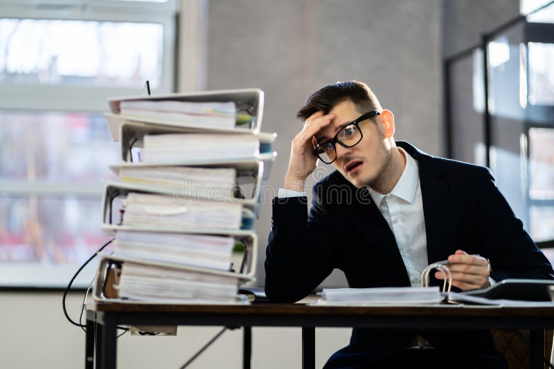 Bored Workaholic Businessman at Office Desk Stock Image - Image of ...