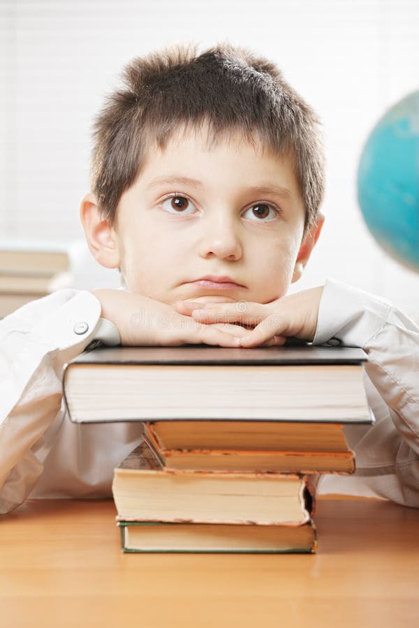 Boring Boy Leaning on Stack of Books Stock Image - Image of person ...