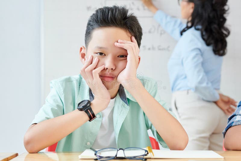 Boring lesson stock image. Image of class, table, classroom - 194877979