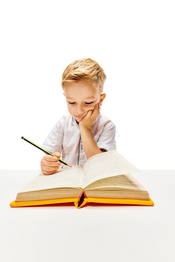 Boring Boy of Elementary Class Sitting at Desk Put His Head on ...