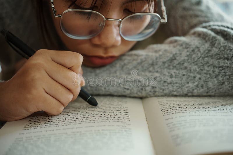 Boring Student Girl Lying on Book and Reading Book, Student Girl at ...