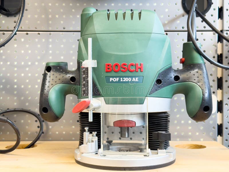 Bosch Pof 1200 Ae Router on Workshop Bench with Power Tools and Cables ...
