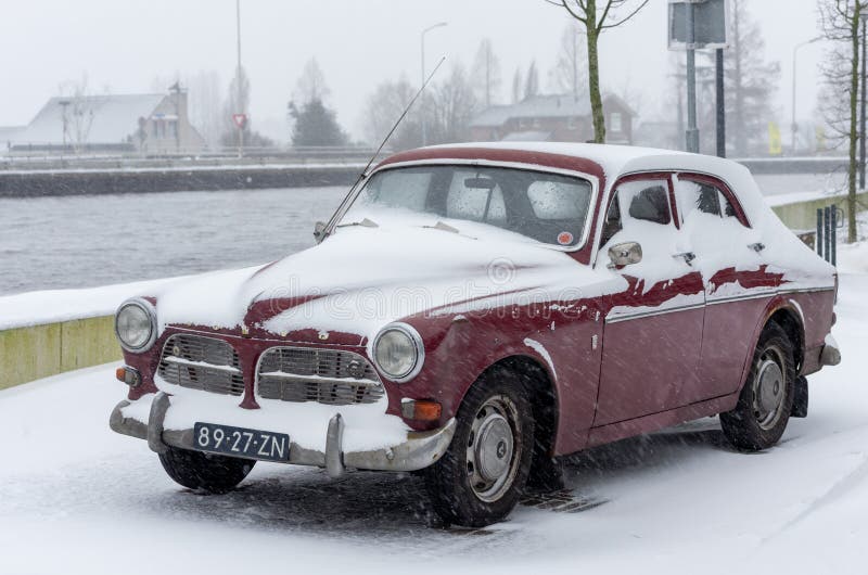 Red Oldtimer Volvo P 12194 Parked with a Thick Layer of Snow Editorial ...