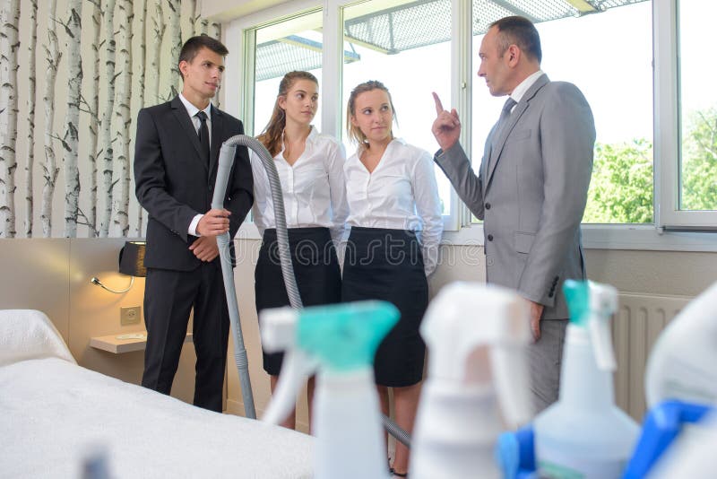 Boss and Apprentices in Cleaning School Stock Image - Image of maid ...