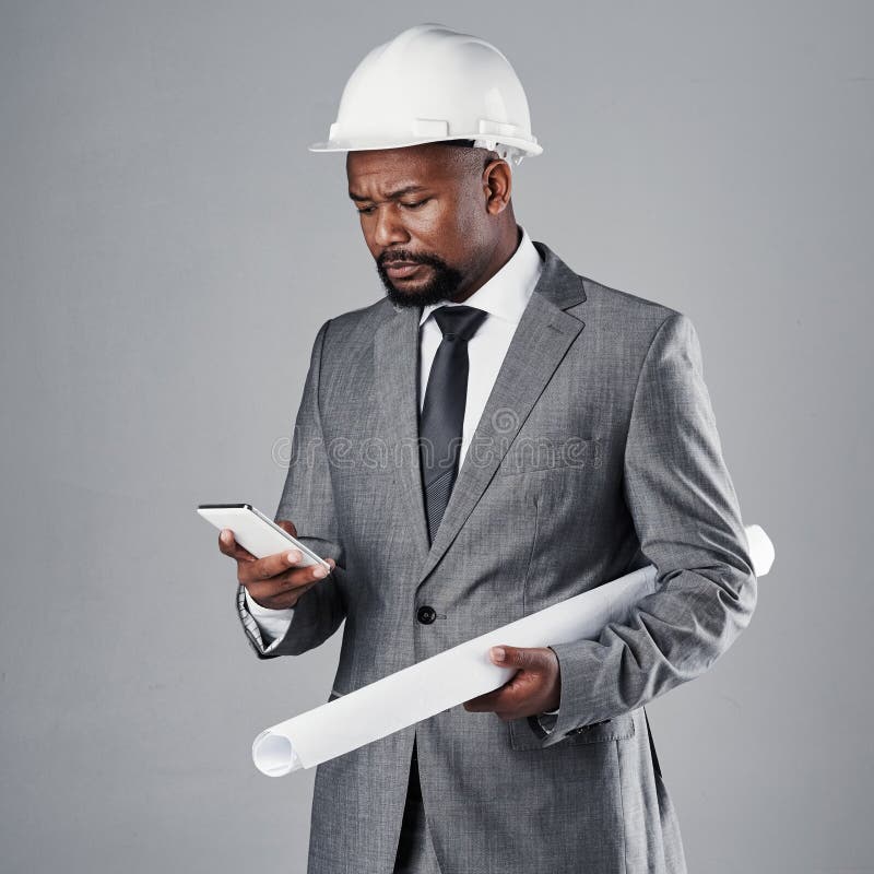 The Boss is always on Call. a Well-dressed Civil Engineer Using His ...