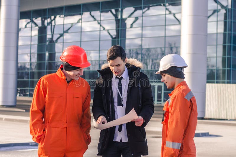 Boss or Chief Instructs Young Team of Young Engineers Stock Photo ...