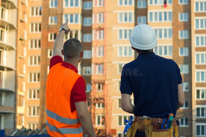 Boss or Chief Shows a Construction Project and How To Build To Engineer ...