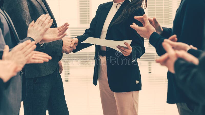 Boss Congratulating the Best Employee at a Work Meeting Stock Photo ...