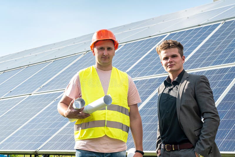 Boss and the Employee are Standing Near the Solar Panels Stock Image ...