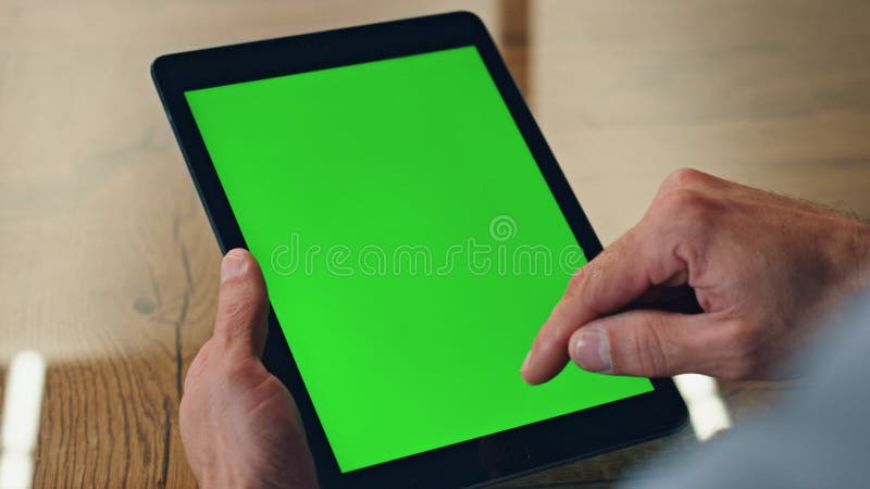 Boss Finger Swiping Greenscreen Tablet Office. Director Hands Scrolling ...