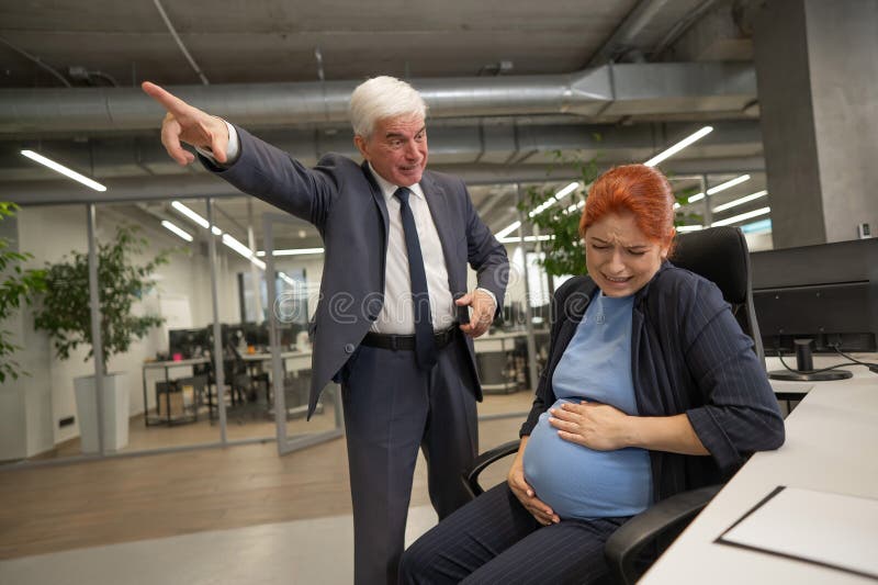 Boss Fires Pregnant Subordinate Woman from Work. Stock Image - Image of ...