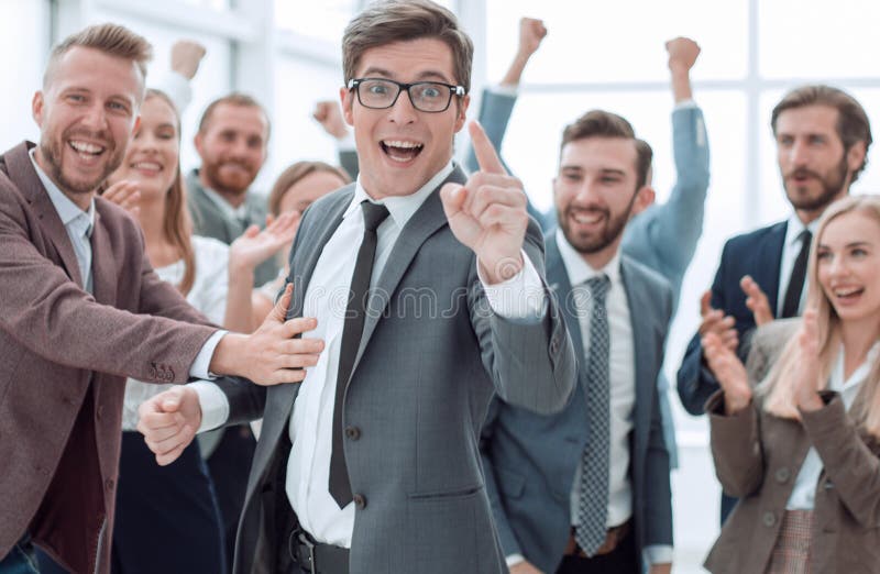 Boss and the Gleeful Business Team Standing Together Stock Photo ...