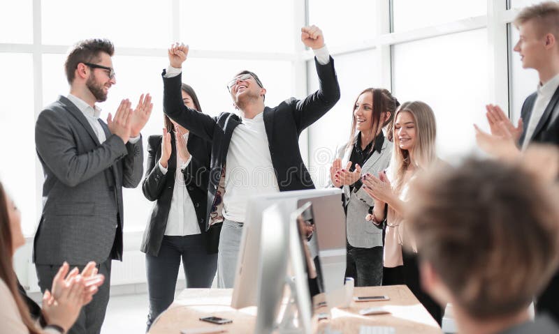 Boss and Happy Employees Applaud Standing in the Office Stock Photo ...