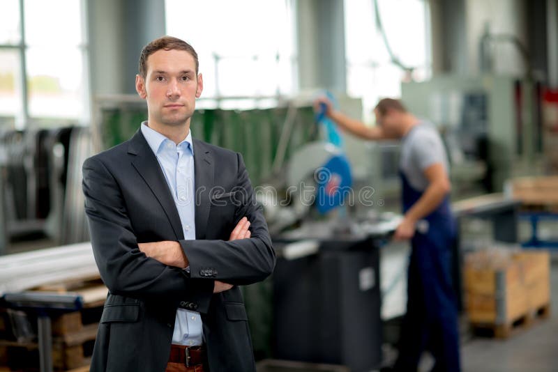 Boss in his factory stock photo. Image of occupation - 46828358