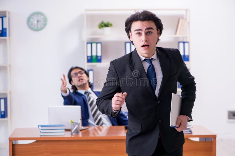 Boss and His Male Assistant Working in the Office Stock Image - Image ...