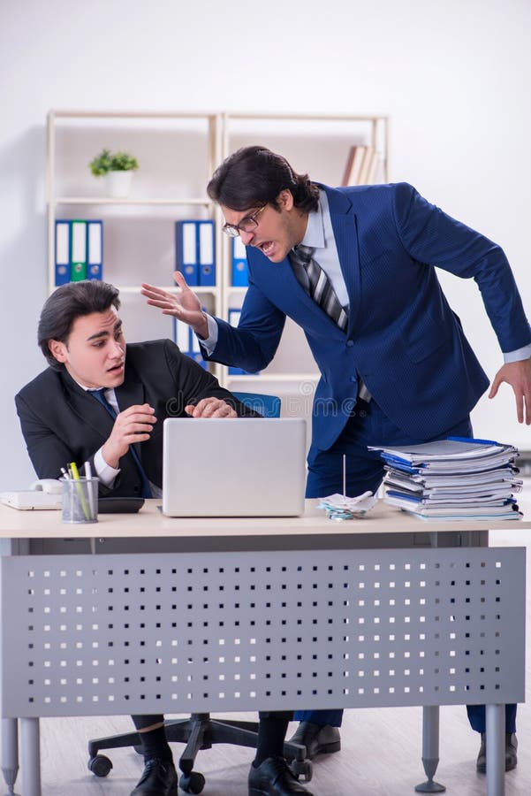 Boss and His Male Assistant Working in the Office Stock Image - Image ...
