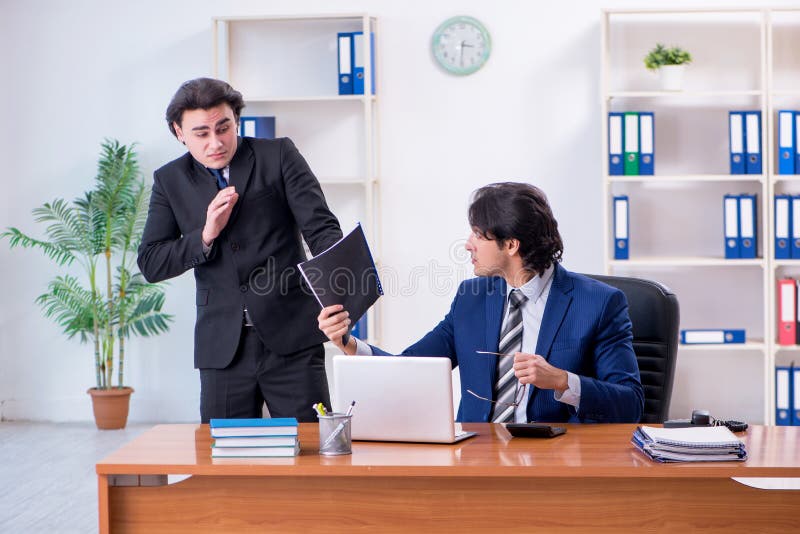 Boss and His Male Assistant Working in the Office Stock Image - Image ...