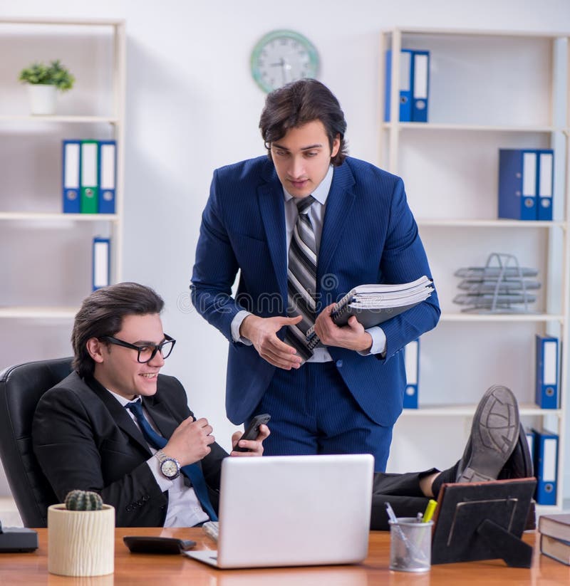 Boss and His Male Assistant Working in the Office Stock Image - Image ...