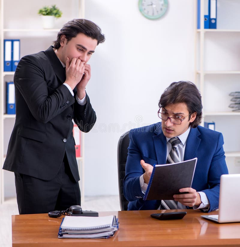 Boss and His Male Assistant Working in the Office Stock Image - Image ...