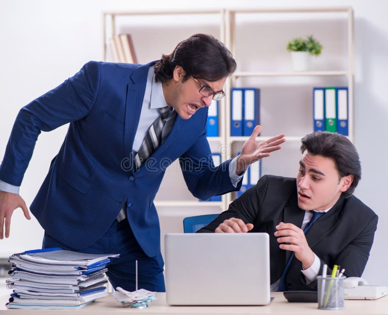 Boss and His Male Assistant Working in the Office Stock Photo - Image ...