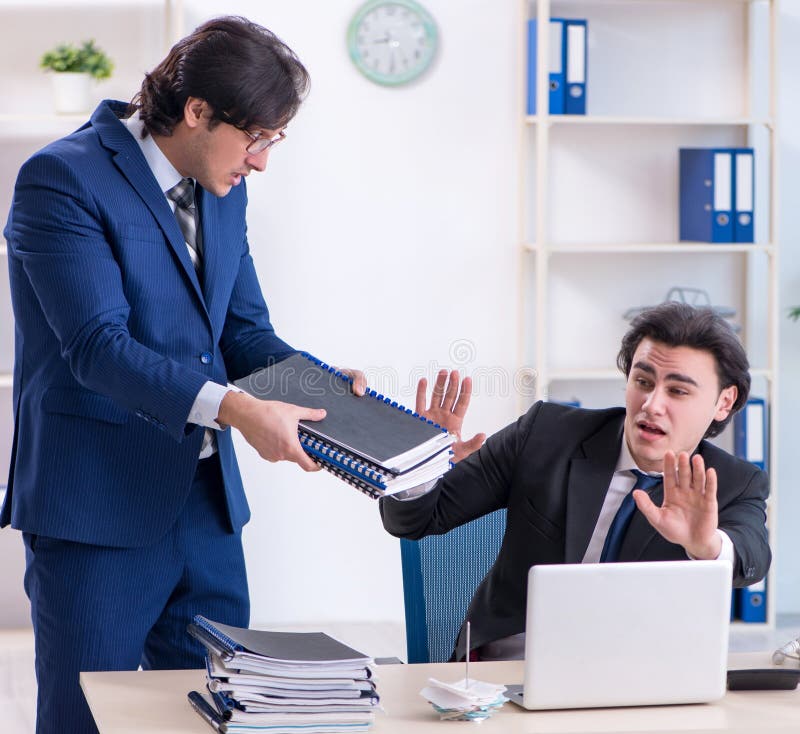 Boss and His Male Assistant Working in the Office Stock Photo - Image ...
