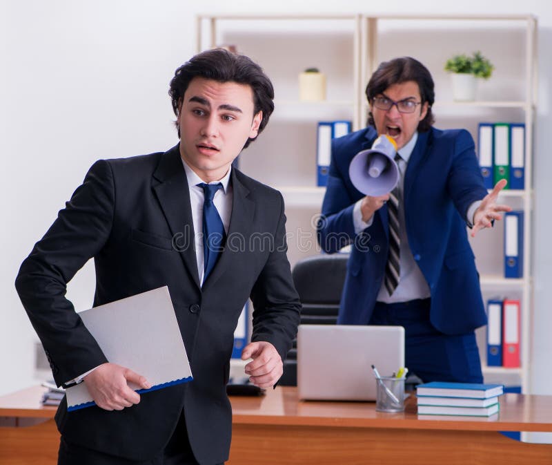 Boss and His Male Assistant Working in the Office Stock Image - Image ...