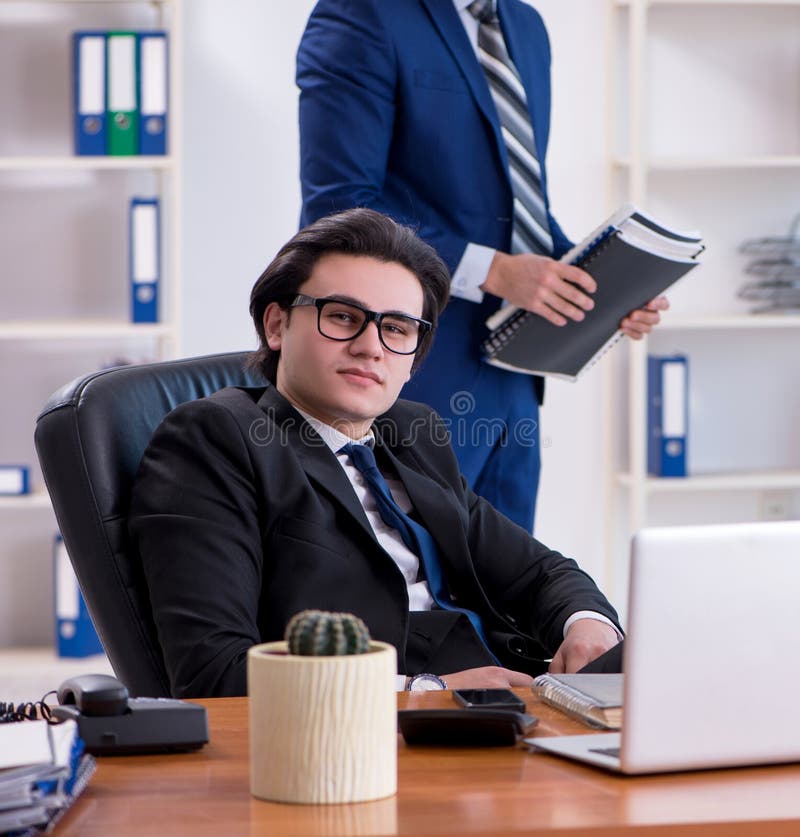 Boss and His Male Assistant Working in the Office Stock Photo - Image ...