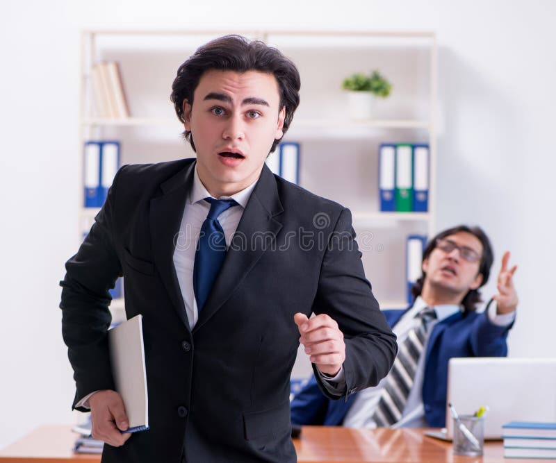 Boss and His Male Assistant Working in the Office Stock Image - Image ...