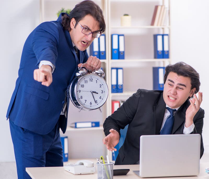 Boss and His Male Assistant Working in the Office Stock Image - Image ...
