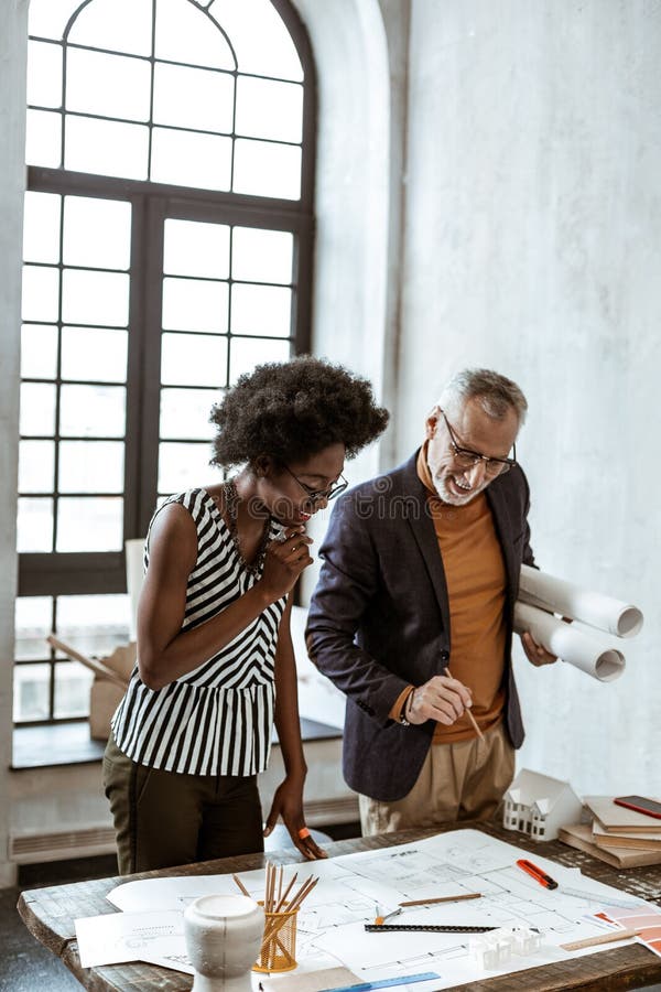 Boss of Interior Design Company Helping His Employee with Task Stock ...