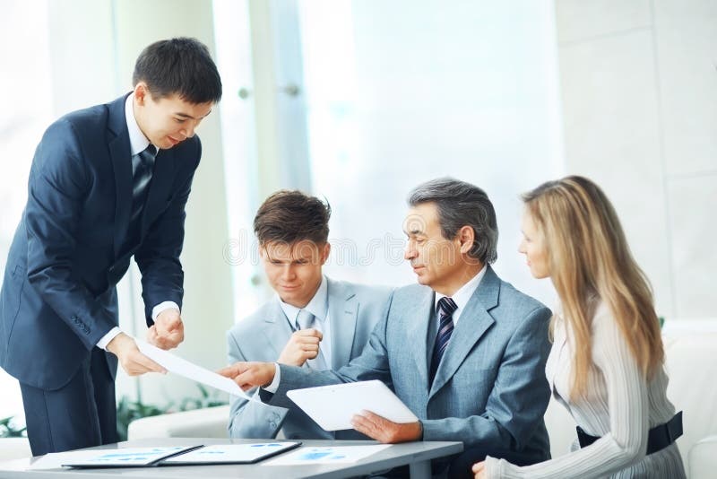 Boss with L Tablet and His Business Team Stock Photo - Image of ...