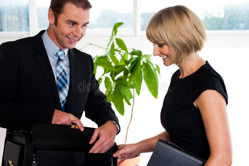Businessman Holding Opening Leather Briefcase Stock Photos - Free ...