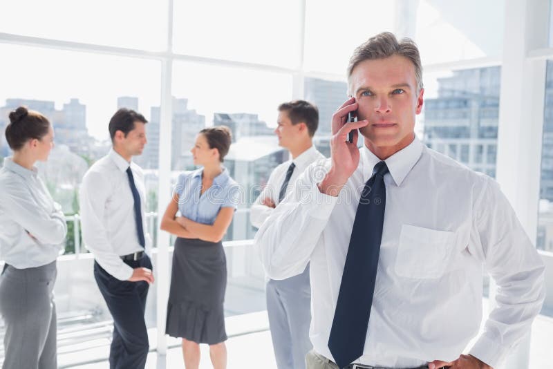 Boss on the Phone Standing in a Modern Office Stock Photo - Image of ...