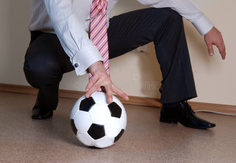 Boss playing football stock image. Image of masculine - 3674789