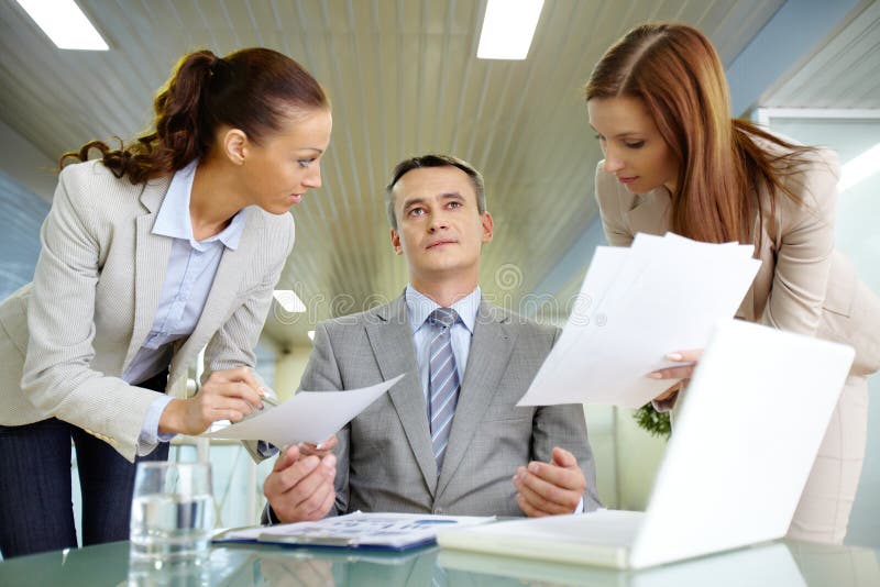 Boss and secretaries stock image. Image of employee, paper - 32048359