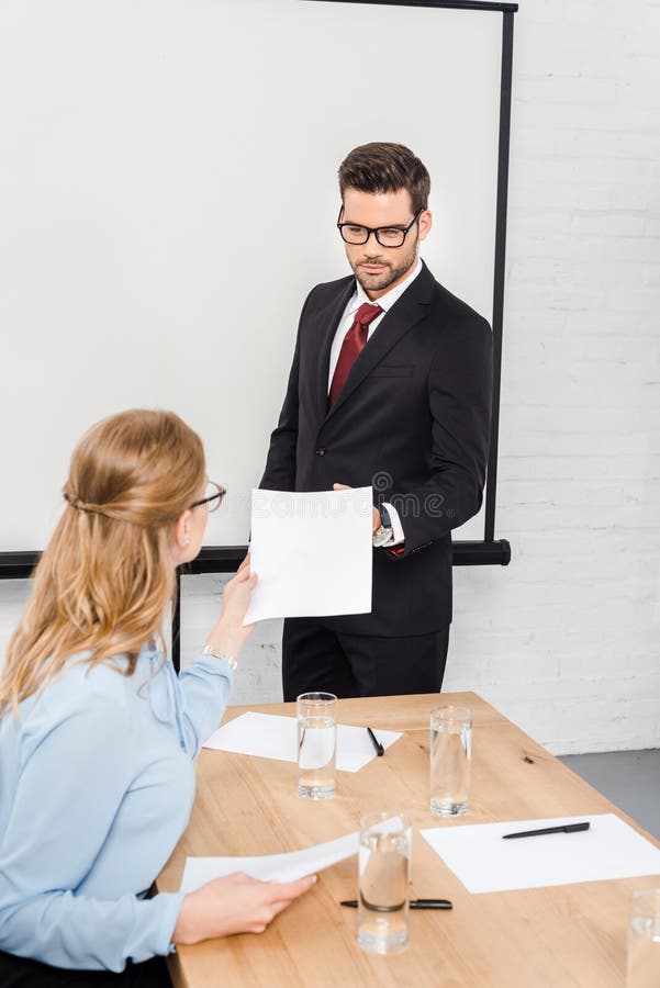 Boss Taking Papers from Manager at Conference Hall Stock Photo - Image ...