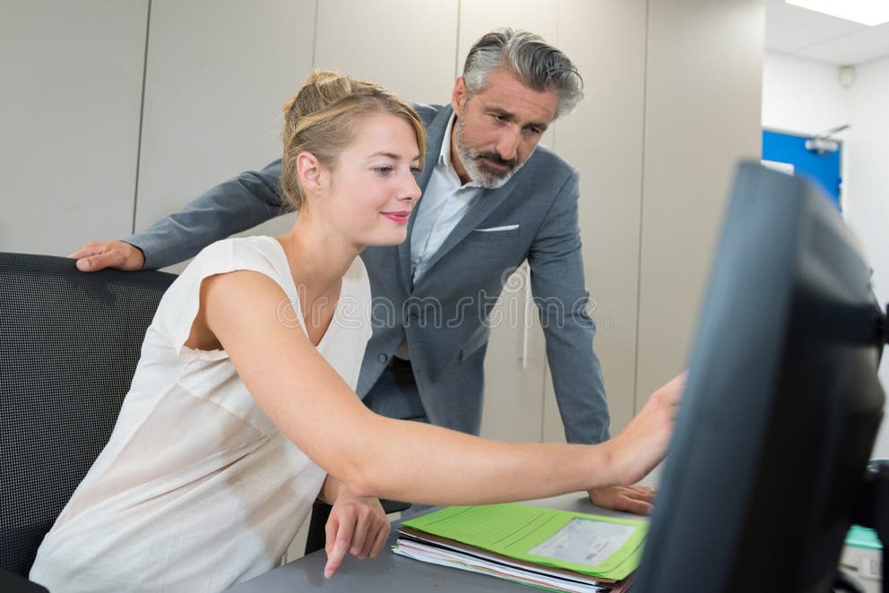 Boss talking to employee stock image. Image of check - 150568547