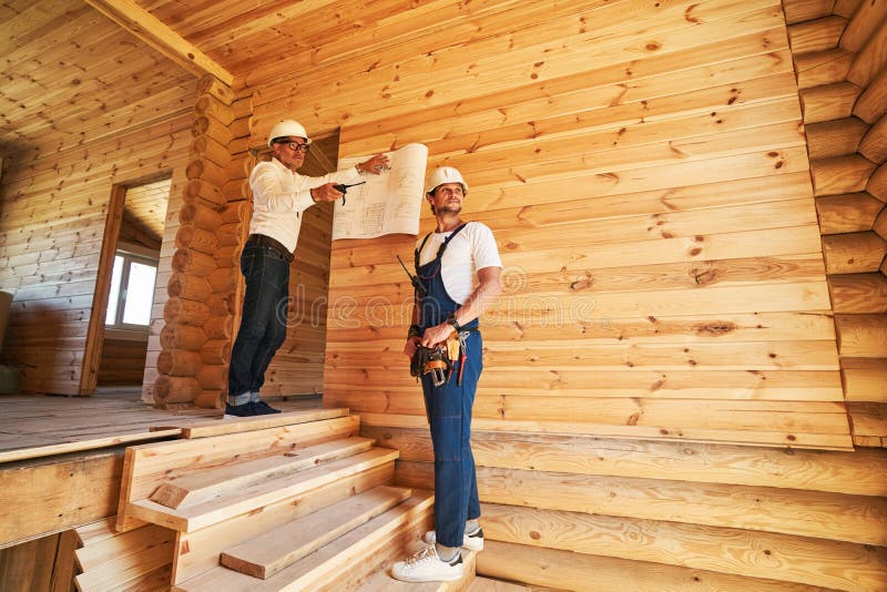 Boss Telling Builder What To Do with Help of Blueprint Stock Image ...