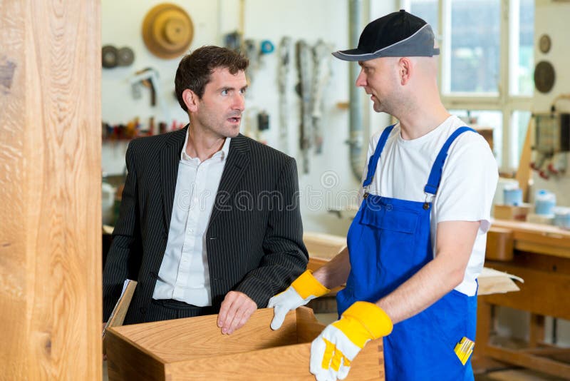 Boss and Worker in a Carpenter S Workshop Stock Photo - Image of ...
