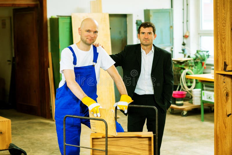 Boss and Worker in a Carpenter S Workshop Stock Photo - Image of boss ...