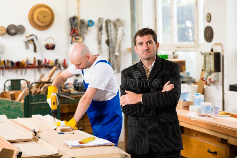 Boss and Worker in a Carpenter S Workshop Stock Image - Image of ...